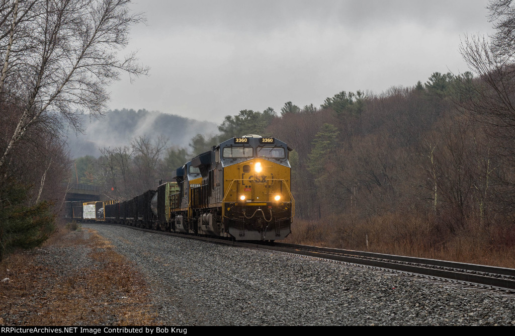 CSX 3360 leads a manifest freight eastbound under the NY Route 22 bridge